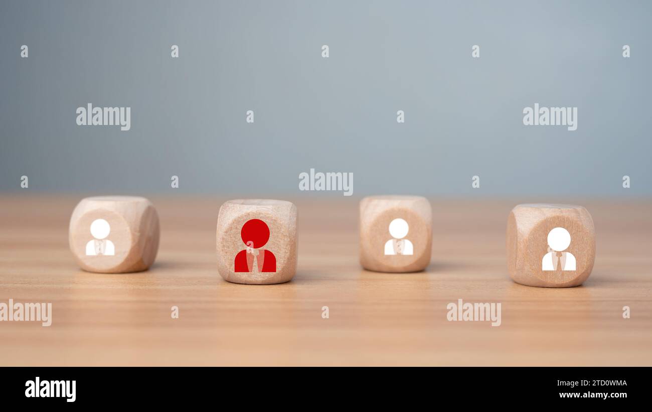 Wooden block printed icon of CRM concept representing business goal ...