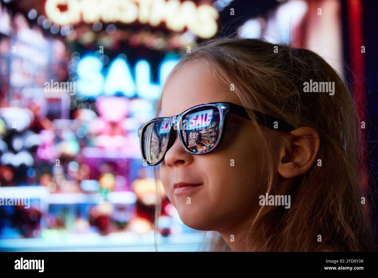 Little girl window shopping in hi-res stock photography and images - Alamy