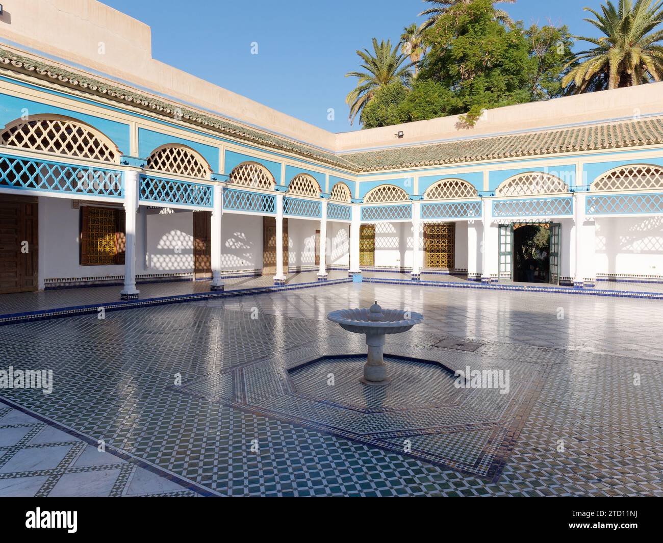 Courtyard with fountain and wooden verandas in the Bahia Palace in the ...