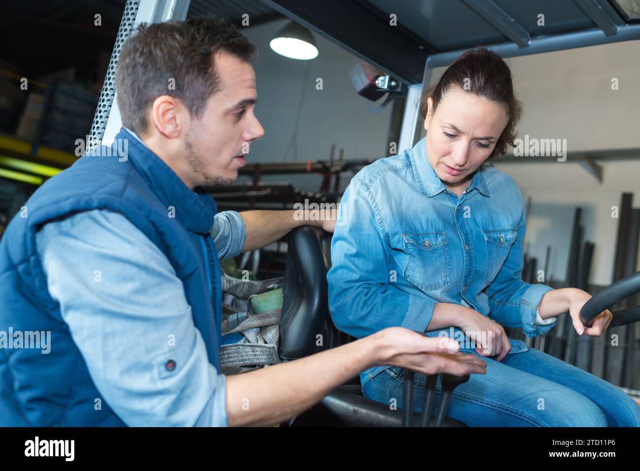forklift driver and supervisor with at warehouse Stock Photo - Alamy