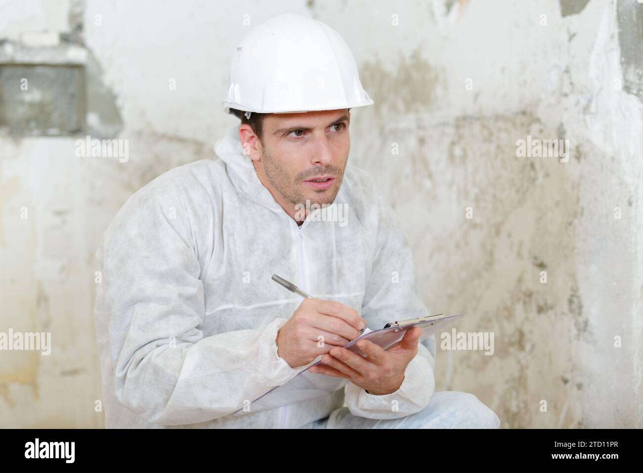 Handsome construction builder thinking something hi-res stock ...