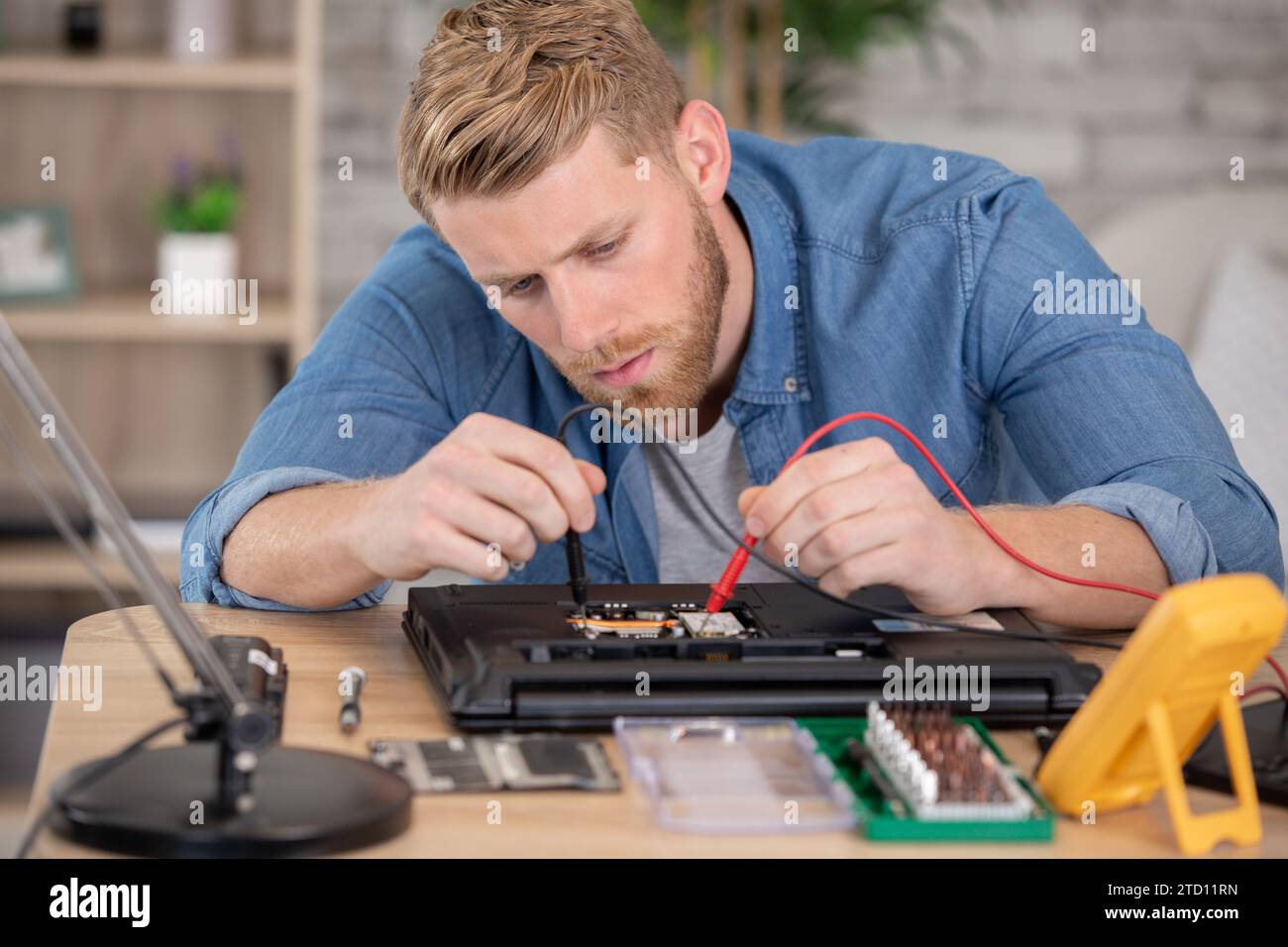 technician using voltage meter for voltage measurement Stock Photo - Alamy