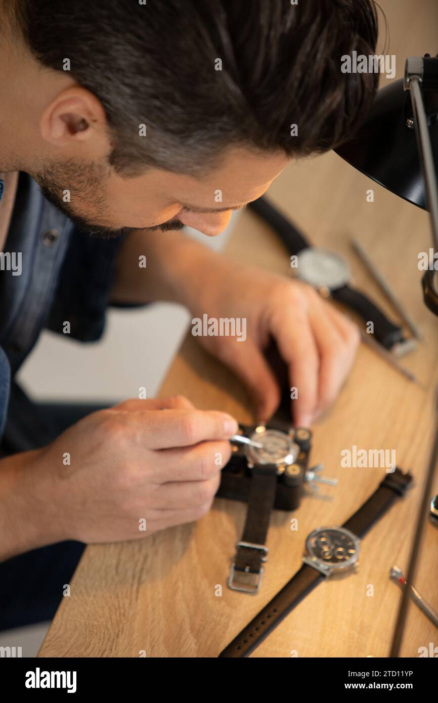 Fixing watches hi-res stock photography and images - Alamy
