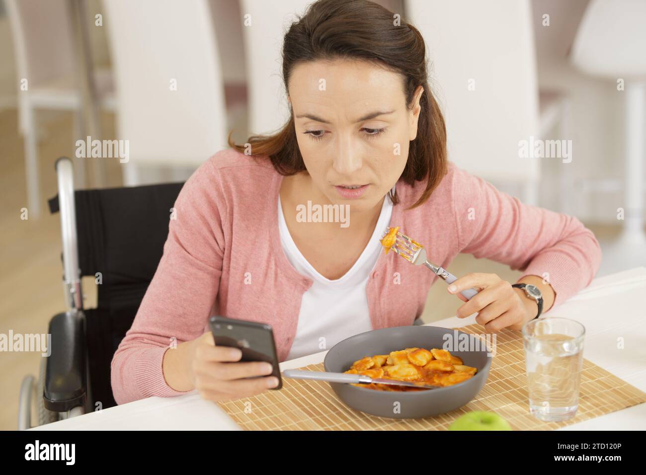 disable woman disabled on wheelchair reading a text Stock Photo - Alamy