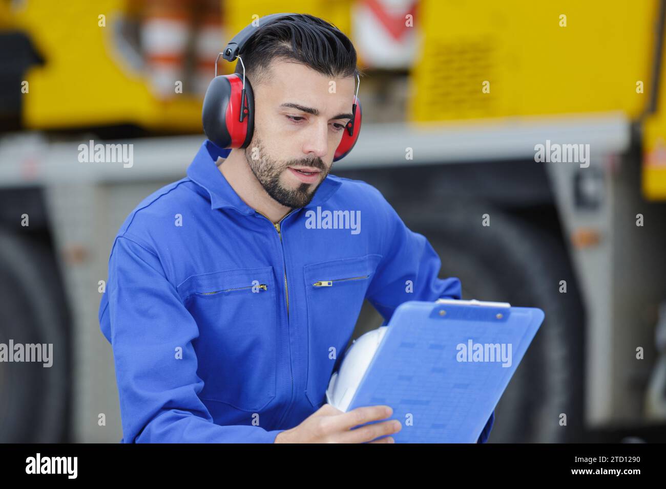 Back view male engineer clipboard hi-res stock photography and images ...