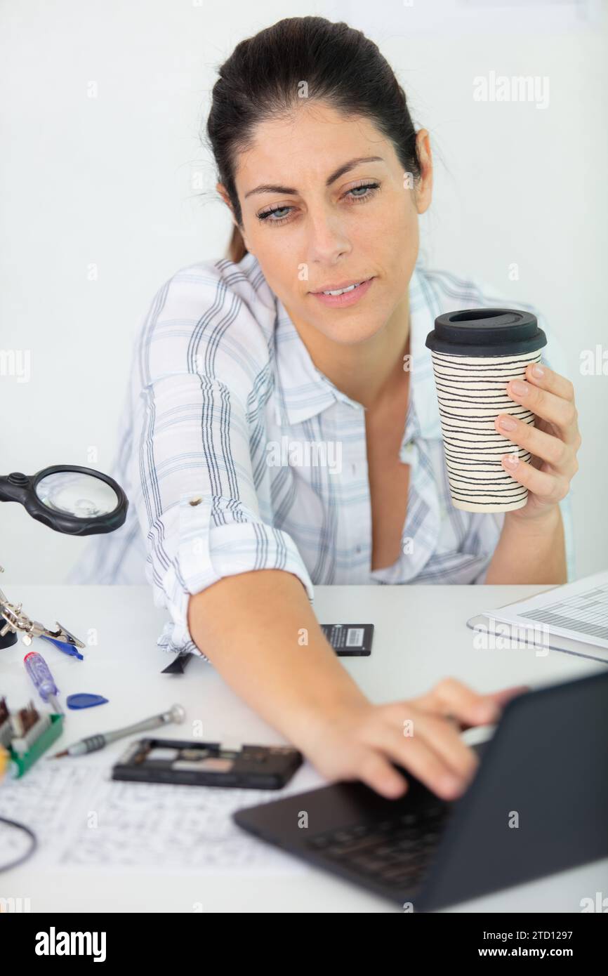 happy female entrepreneur having video call over computer Stock Photo ...