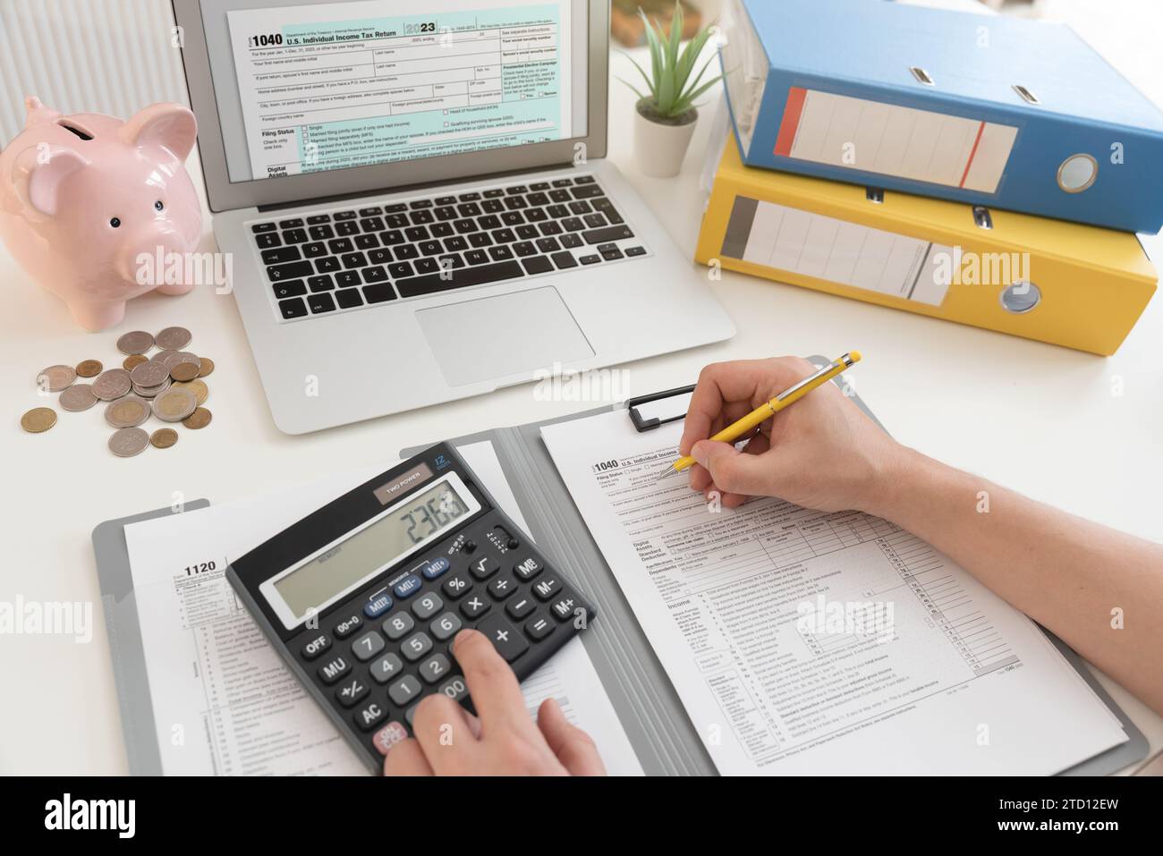 Income tax concept with laptop and US tax forms Stock Photo - Alamy