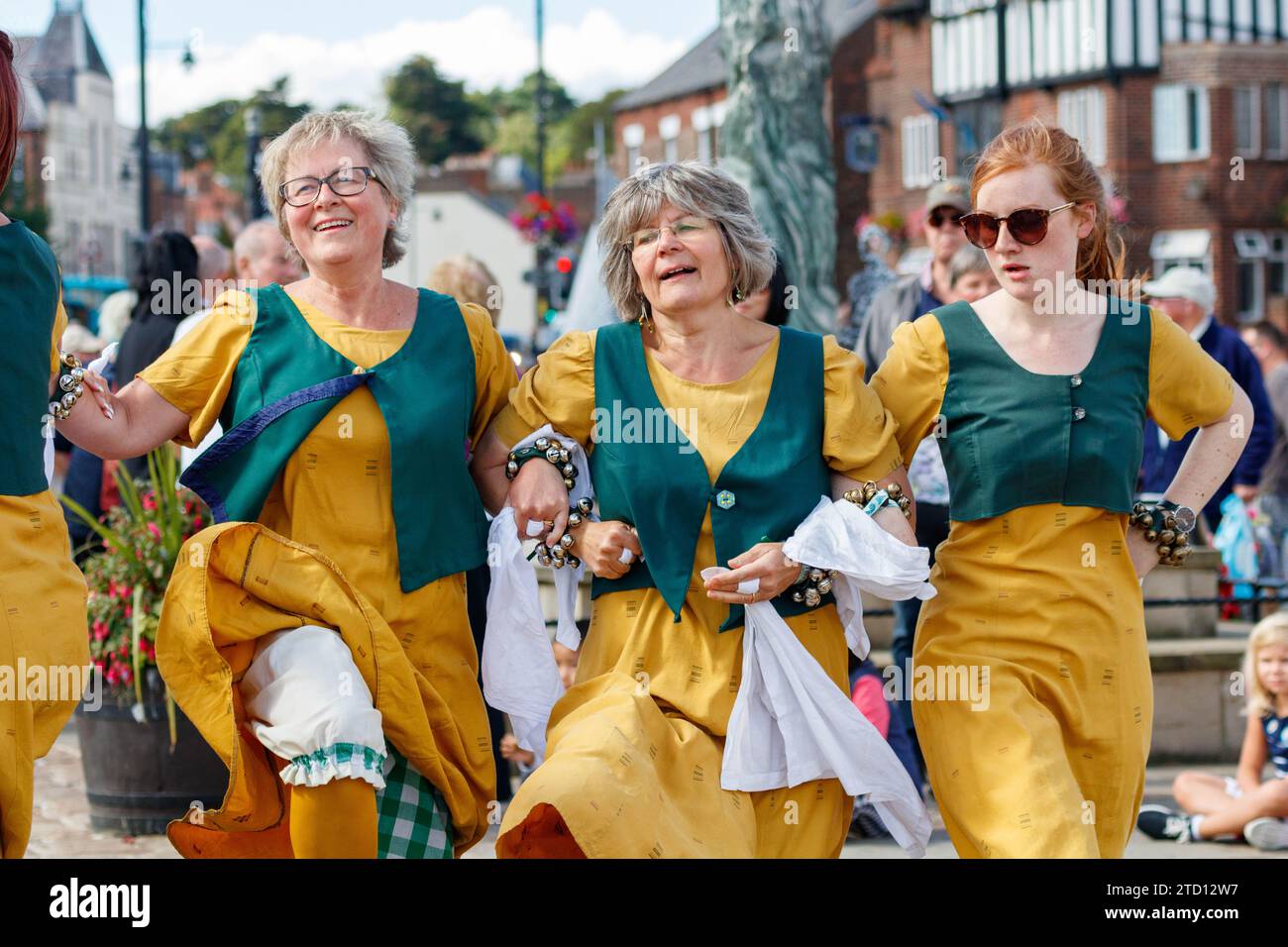 Women morris dancers with Martha Rhoden's Tuppenny Dish at Whitby folk ...