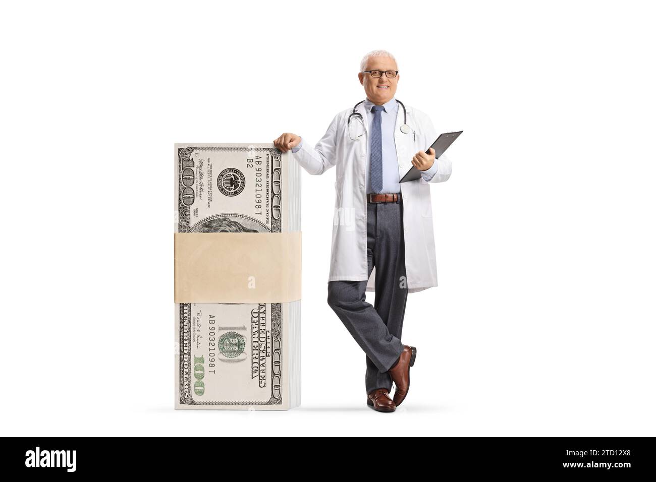 Male doctor leaning on a stack of money and holding a clipboard ...