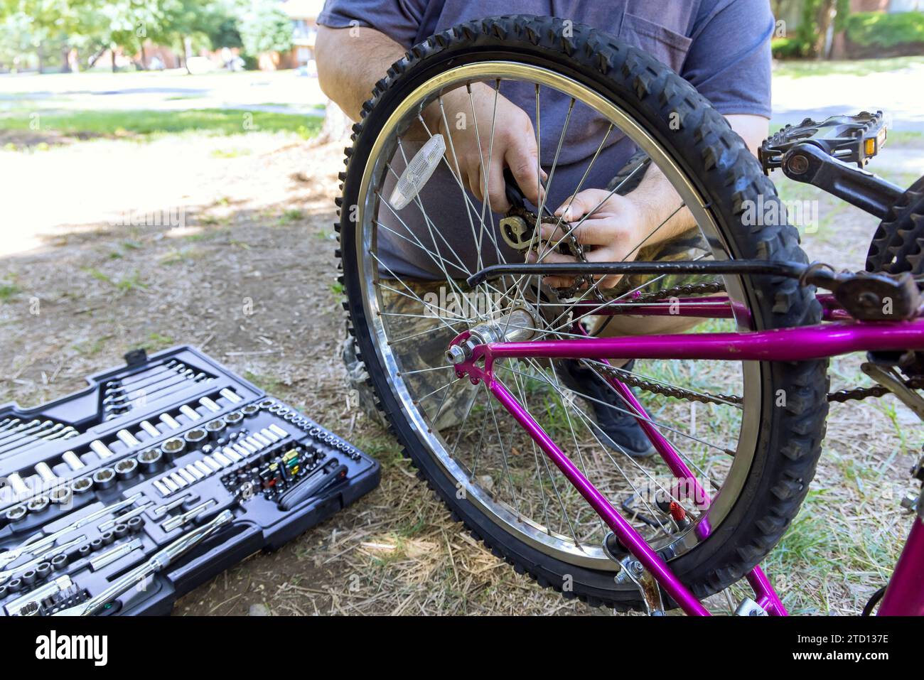 Bike chain repaired hi-res stock photography and images - Alamy