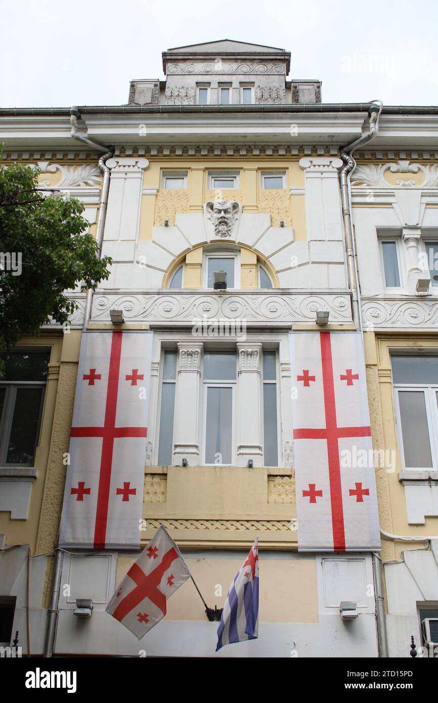 A Georgia state building with Georgian flags hanging Stock Photo - Alamy