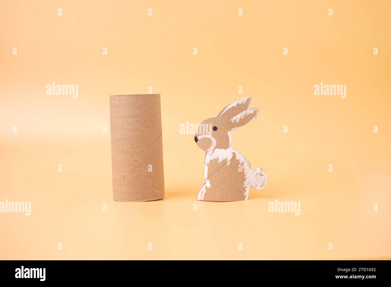 cut out paper rabbit animal tutorial, craft, DIY, a brown and white ...