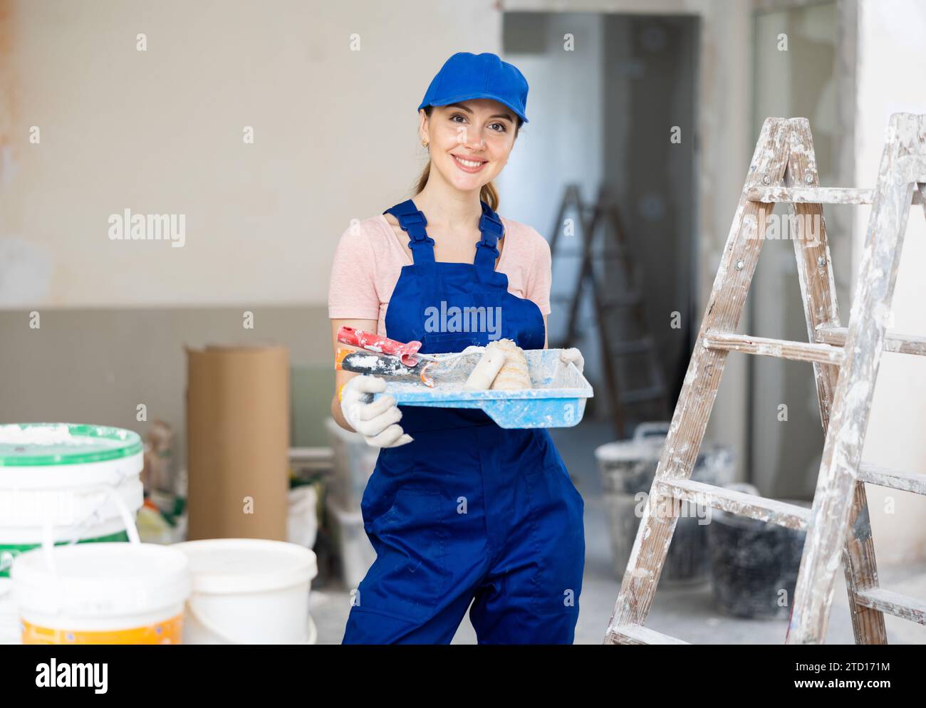Confident professional painter posing hi-res stock photography and ...
