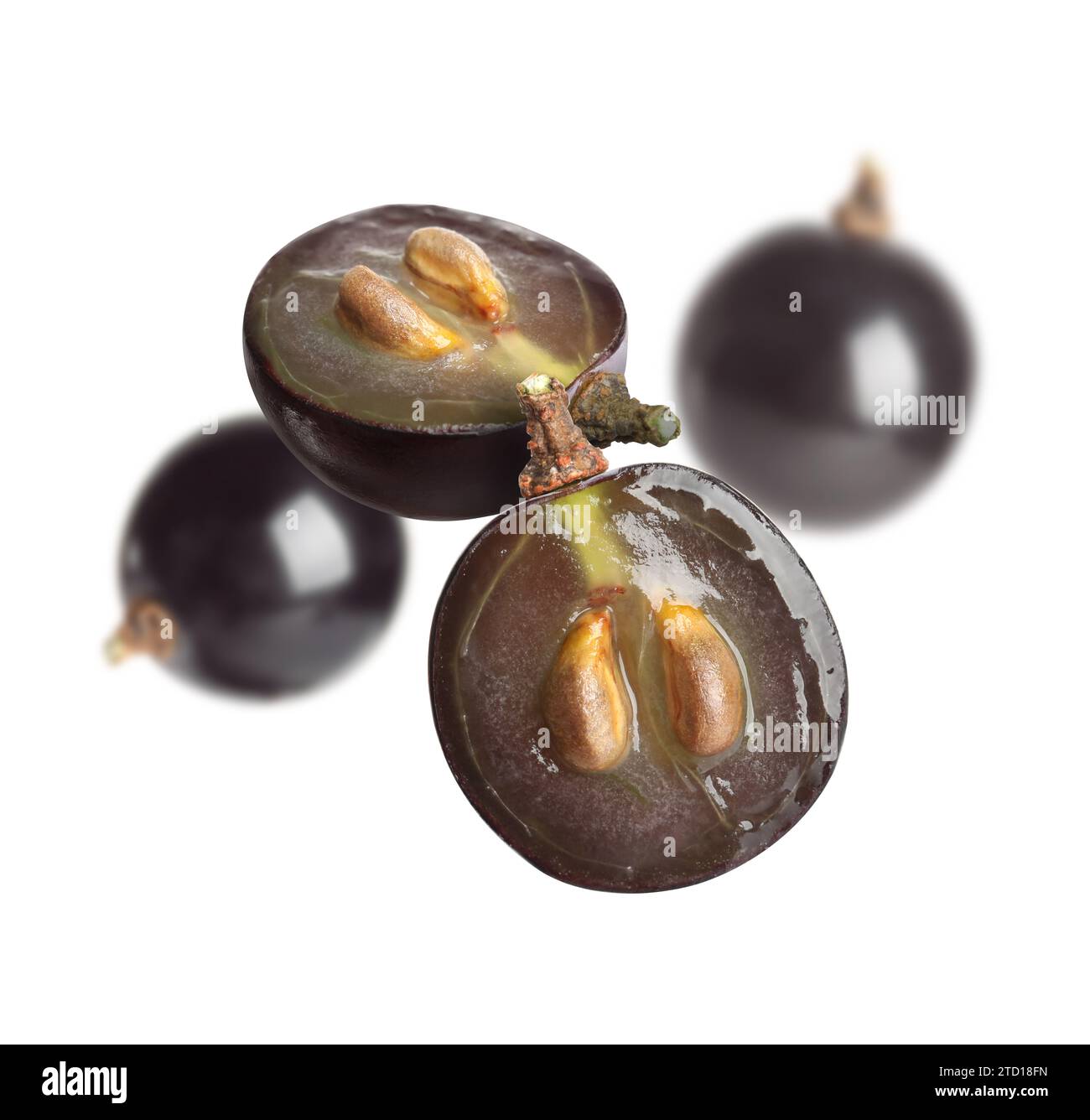 Delicious fresh grapes falling on white background Stock Photo - Alamy