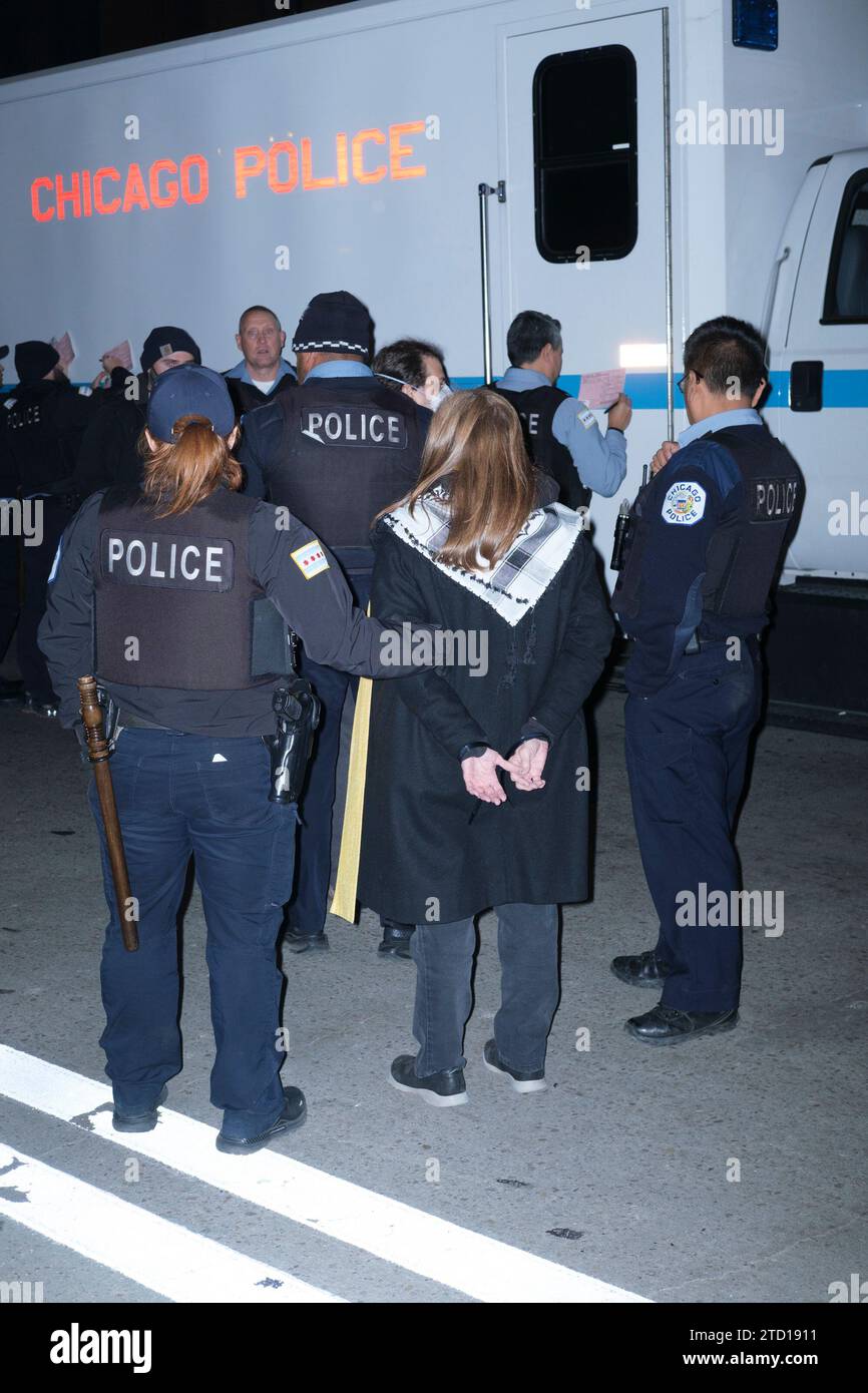 Protesters being arrested for blocking W Washington St at a Jews for ...