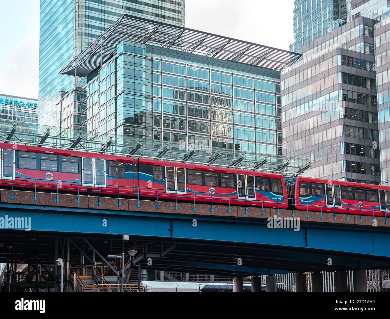 DLR passing buildings Stock Photo - Alamy