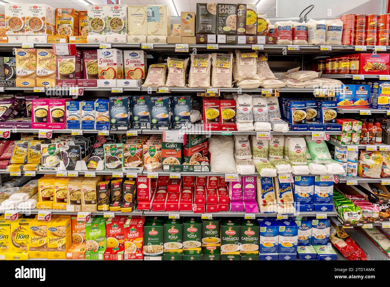 Italy - December 15, 2023: Rice of various types in packages of various ...