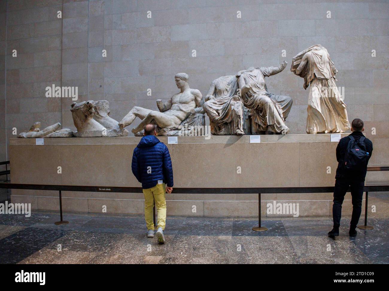 London, UK 15 Dec 2023 Visitors looking at the sculptures. The Elgin Marbles in the Parthenon ...