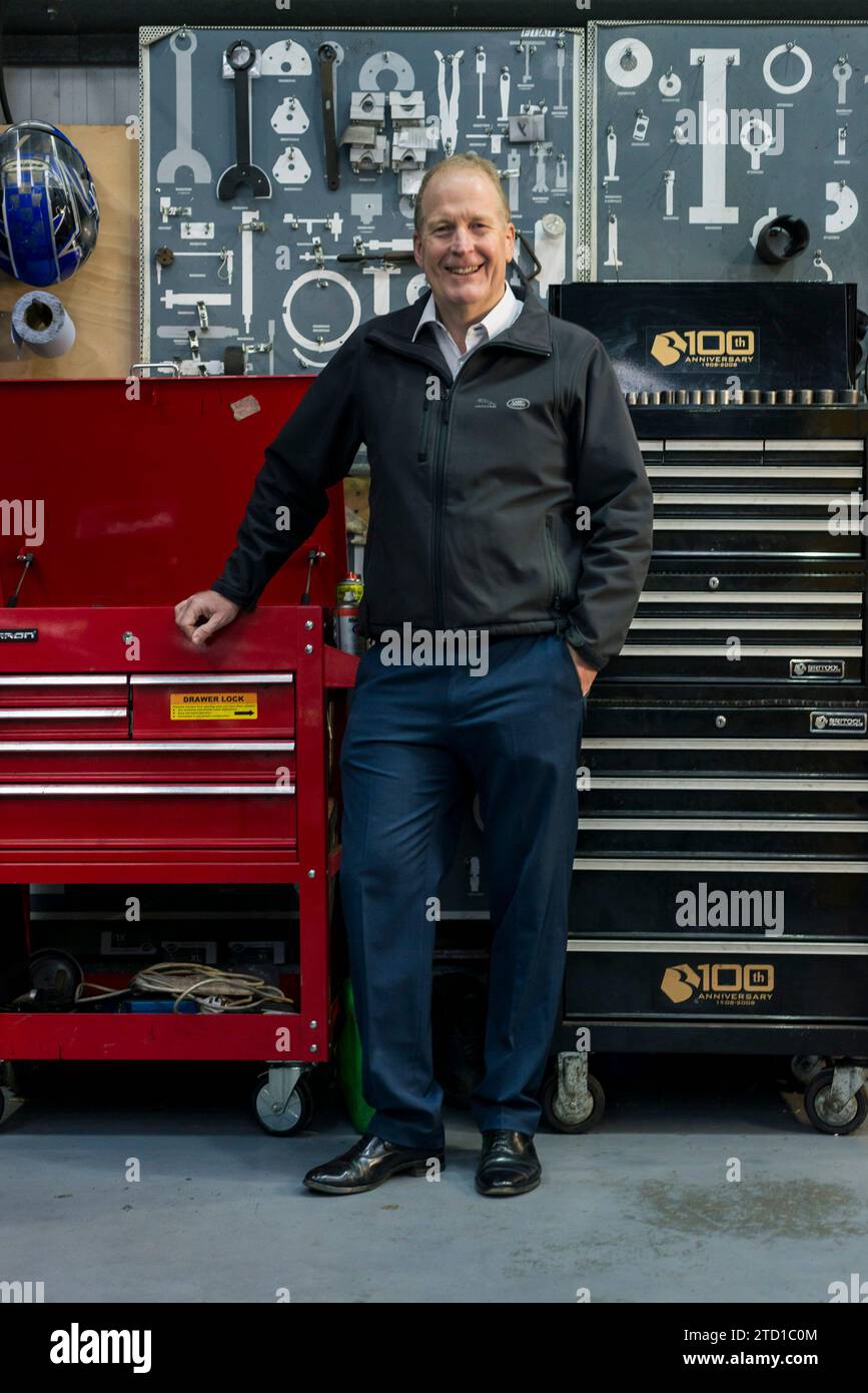 A Land Rover garage owner stands in his mechanics workshop for a ...