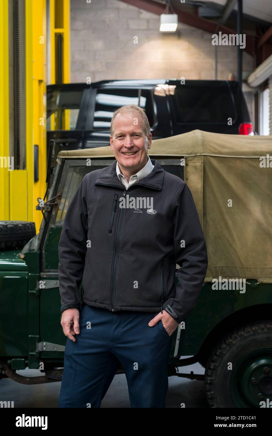 A Land Rover garage owner stands in his mechanics workshop for a ...