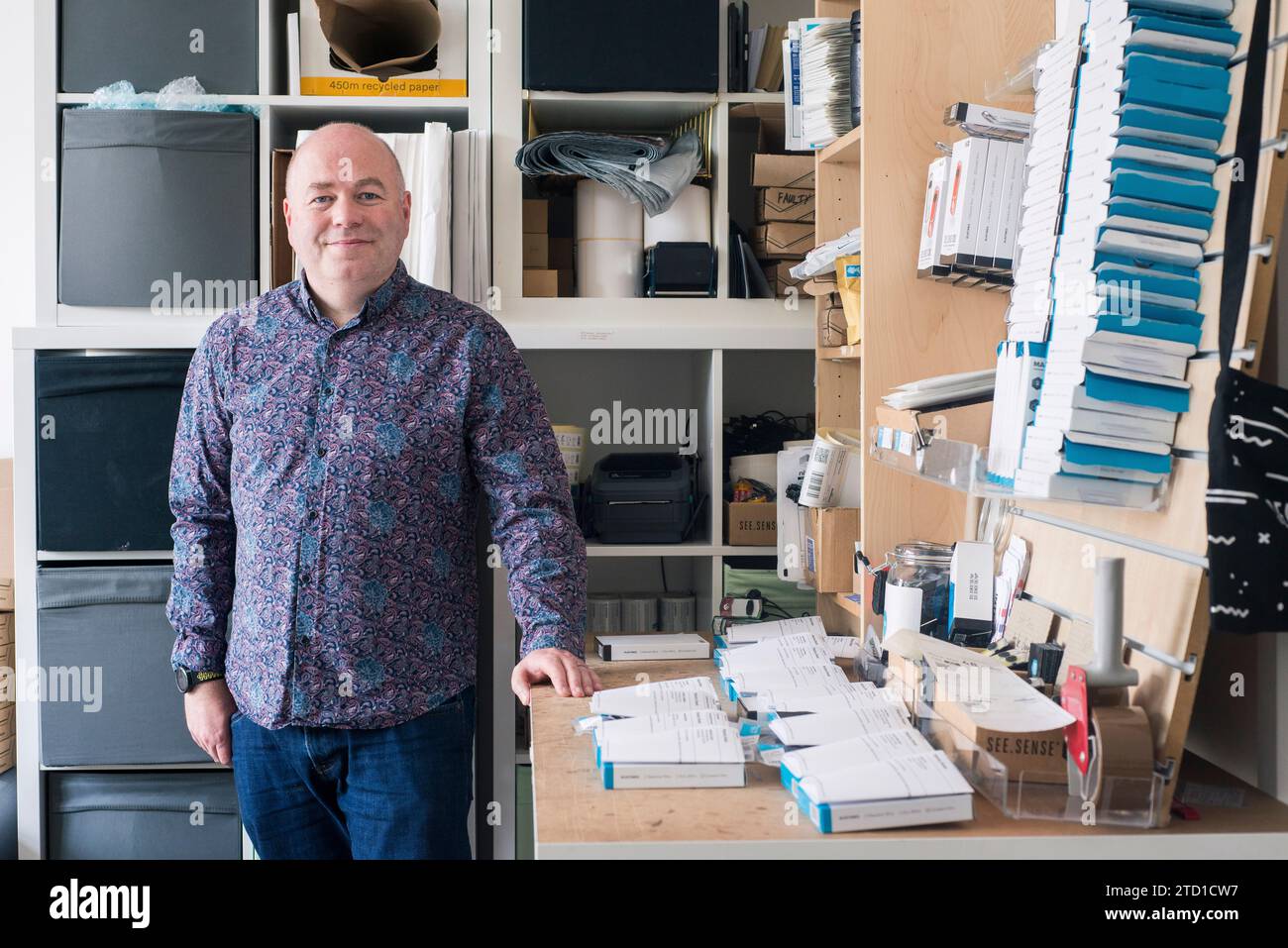 A small business owner and technology manufacturer poses for a portrait ...