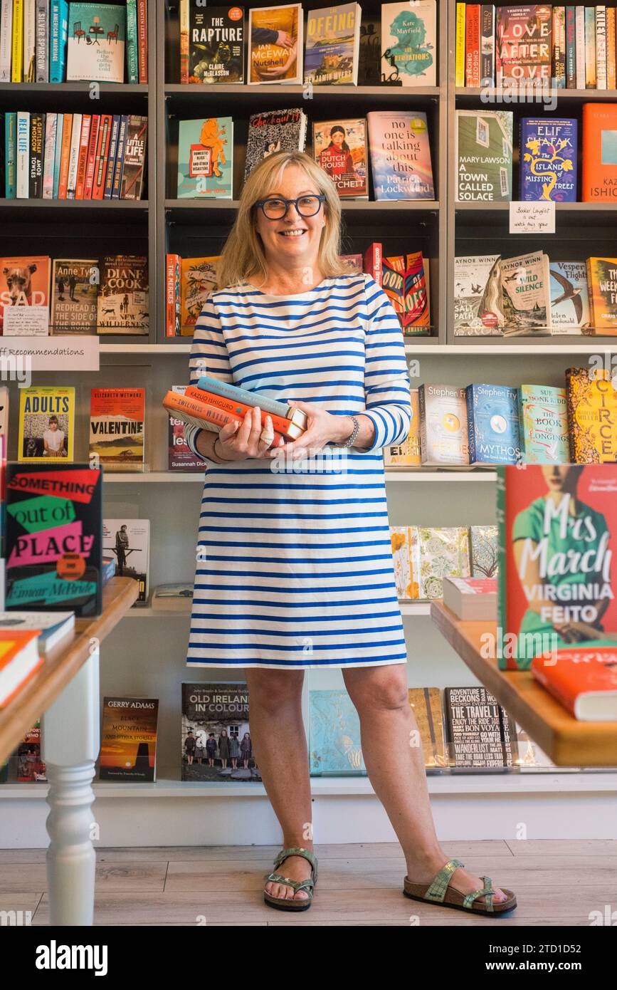 A portrait of a small business owner in her local high street book shop ...