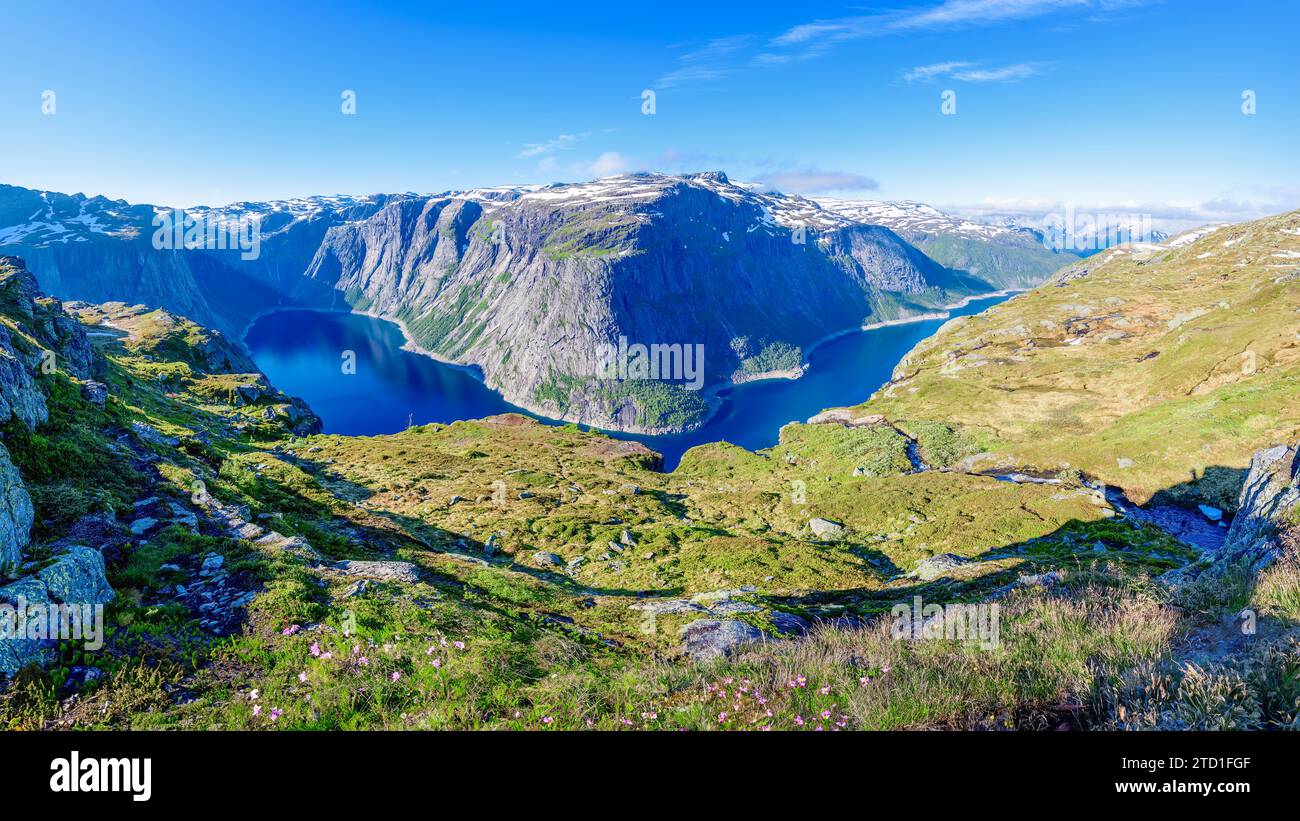A view of the fjord on a summer day in the Hardanger fjord National ...