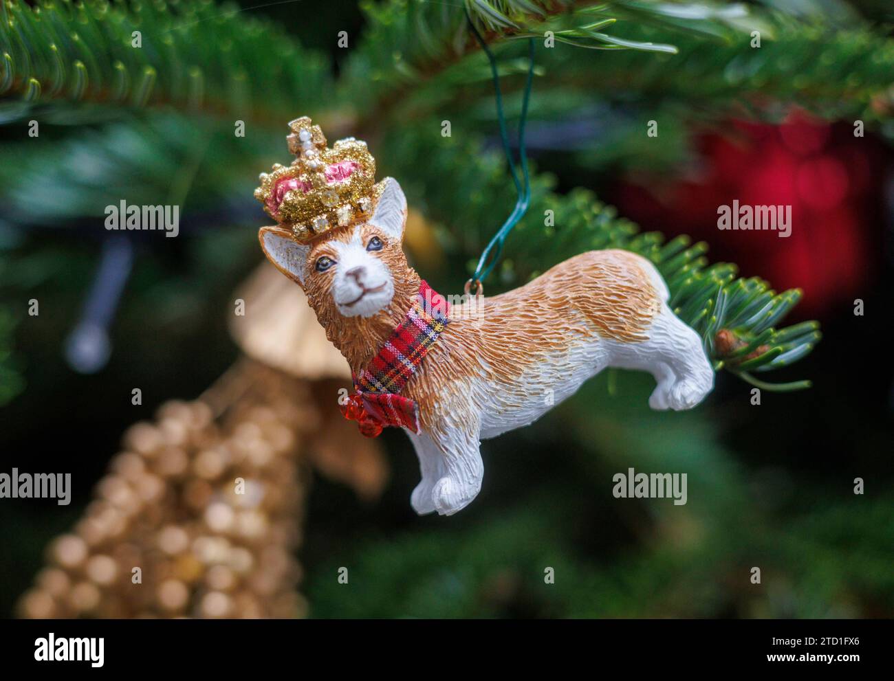 London, UK 15 Dec 2023 Detail of a Corgi wearing a crown, a tribute to ...