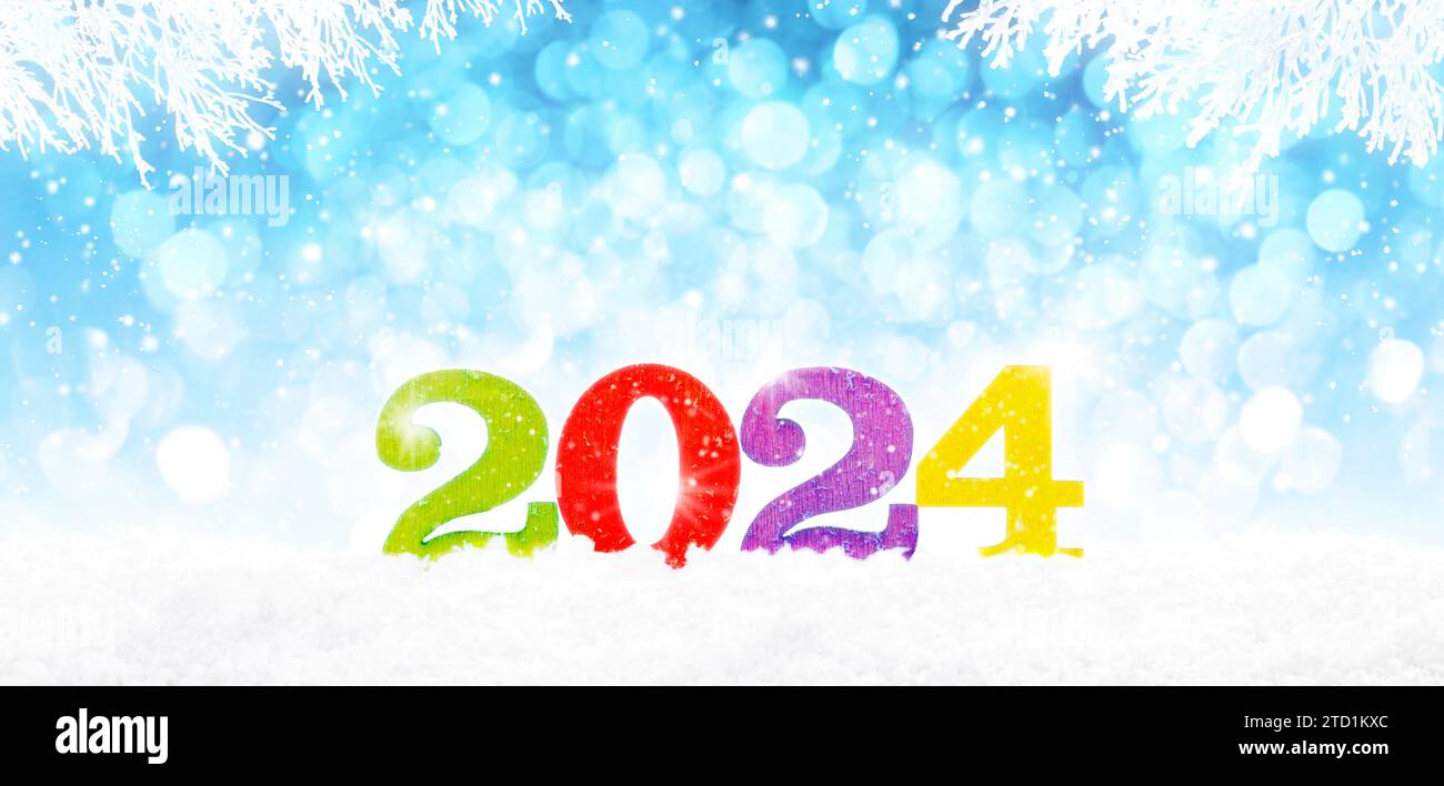 Wooden Colorful 2024 Numbers in perspective on bright blue bokeh winter ...