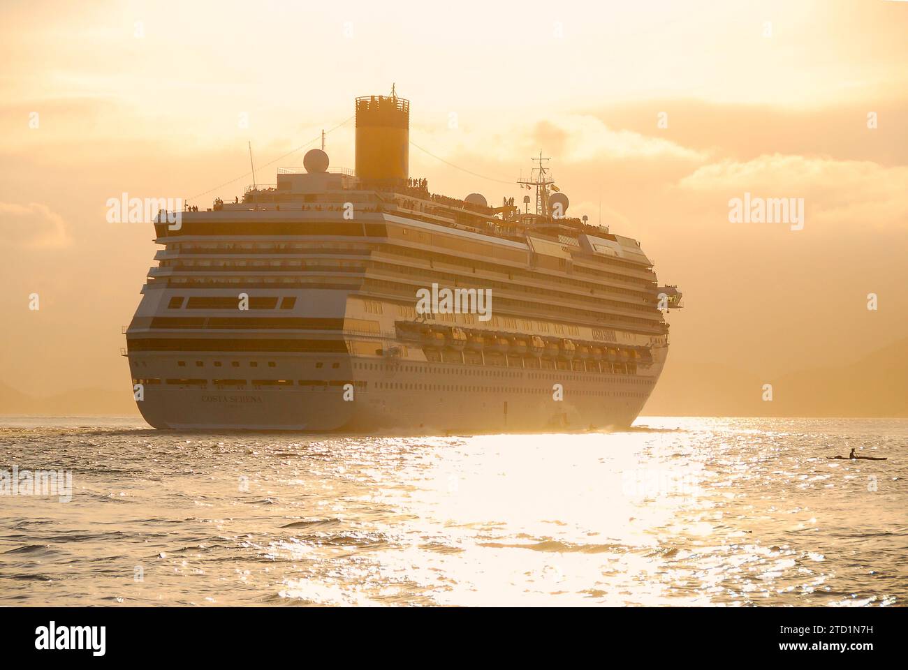 Costa Serena cruise ship sailing during sunset. Golden hour in Santos ...