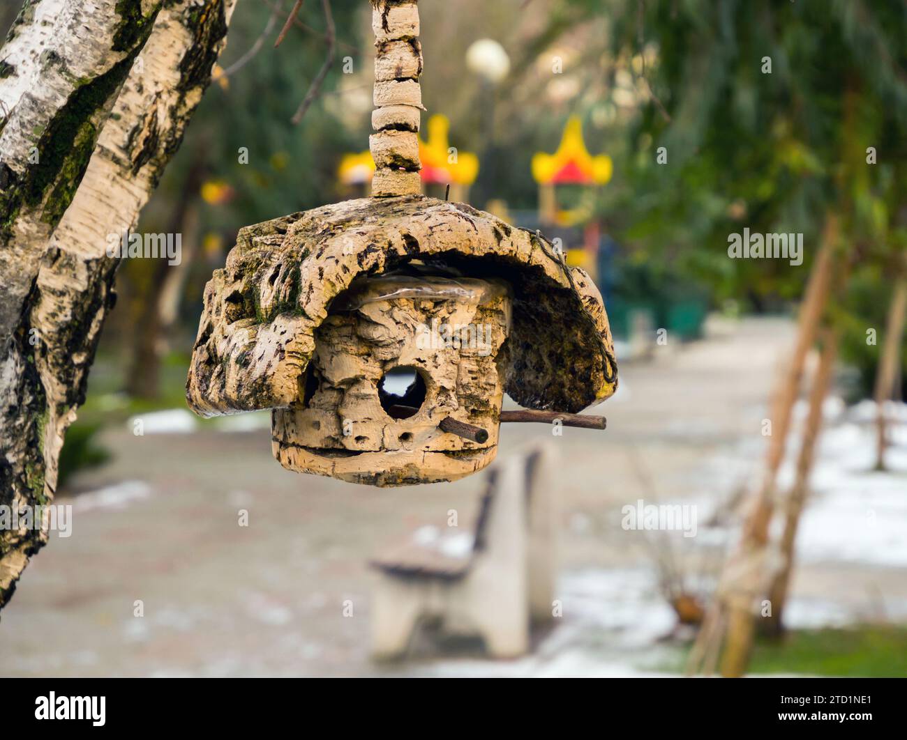 Birdhouse made from tree bark Stock Photo - Alamy