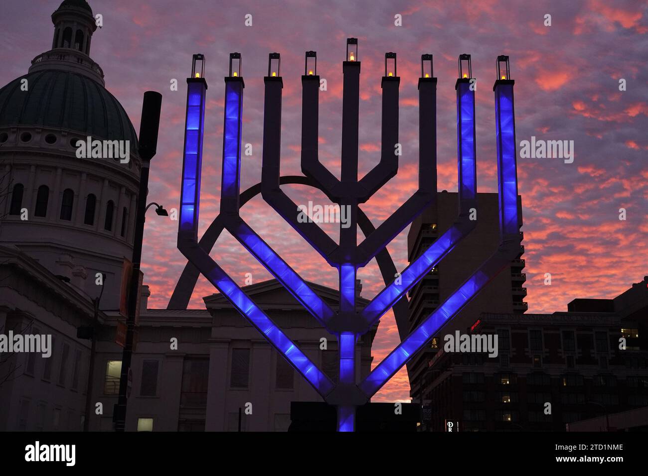 A 30-foot-tall Chanukah menorah burns brightly as dawn arrives on the ...