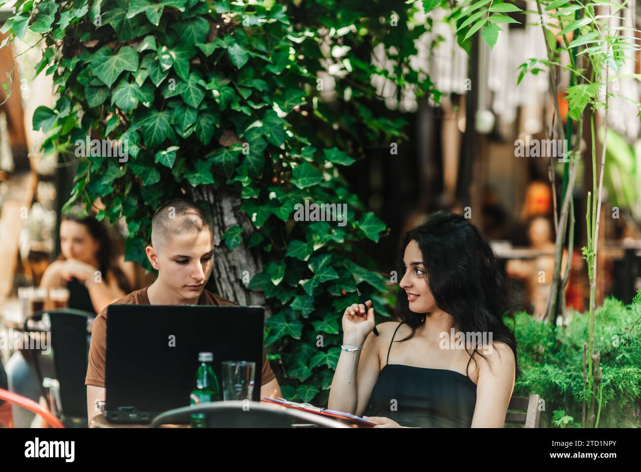Teenagers Discussing Different Topics and Preparing for Exams at a Cozy ...