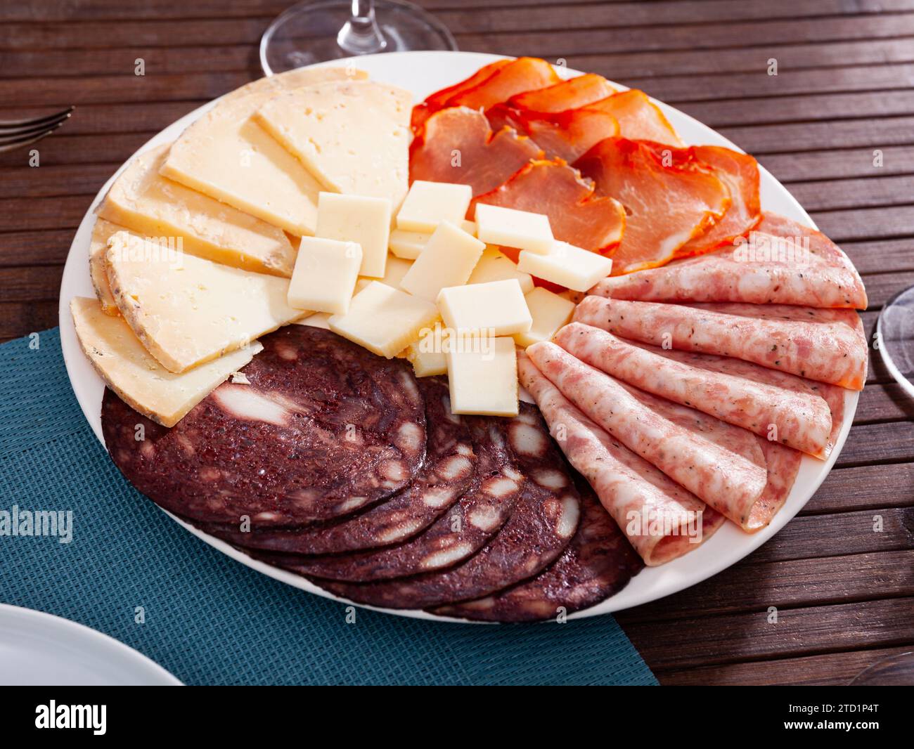 Traditional spanish snack tapas on a plate Stock Photo - Alamy