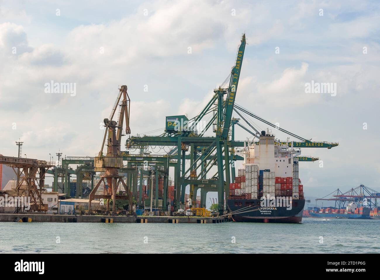 Santos city, Brazil. Ship being loaded at the container terminal at the ...