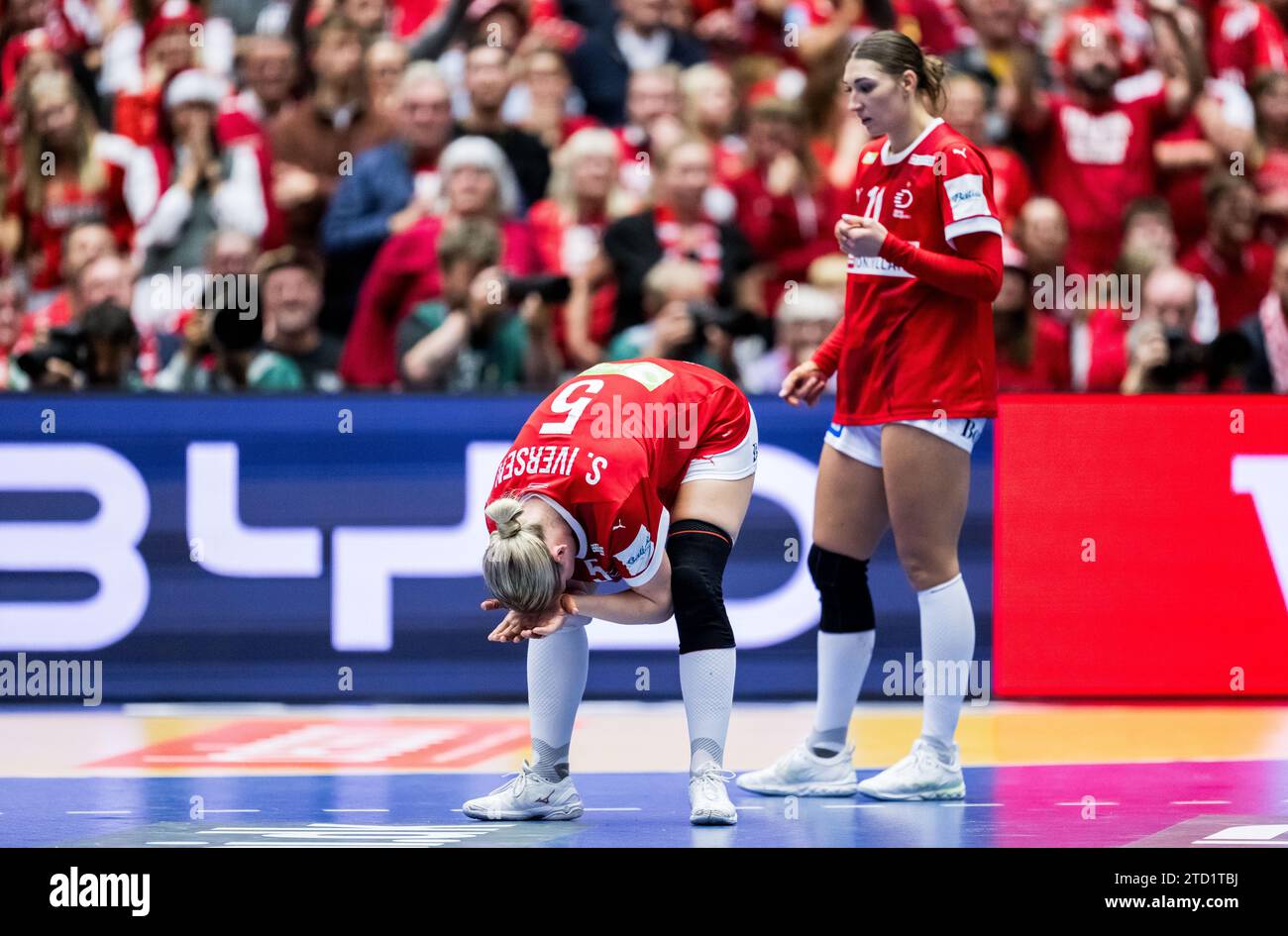 231215 Sarah Iversen and Line Haugsted of Denmark looks dejected after ...