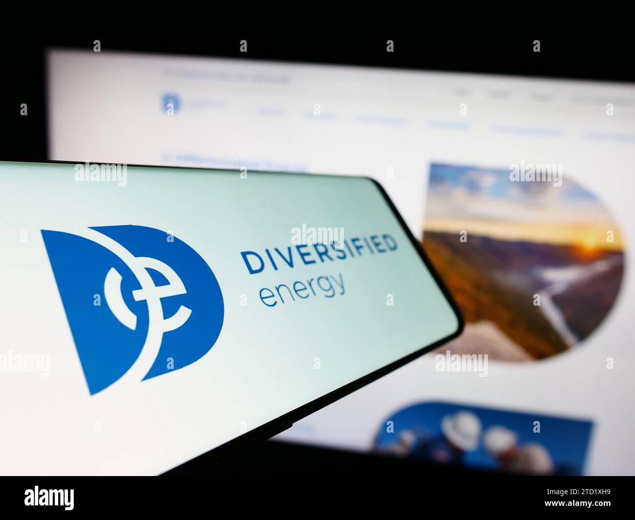 Mobile phone with logo of British business Diversified Energy Company ...