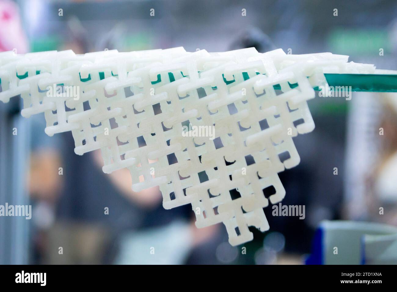 Many white details printed on 3D printer close-up. Parts 3D printed ...