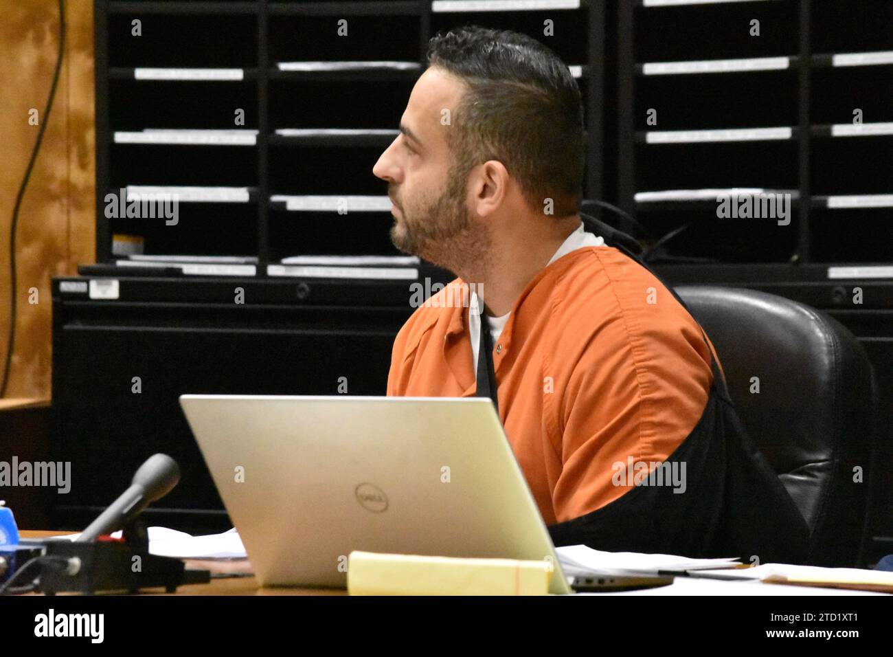 NYPD officer Hariton Marachilian sits at the defendant table inside of ...