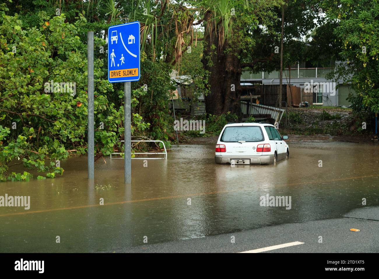 A car inundated with water in the northern beaches suburb of Holloways ...