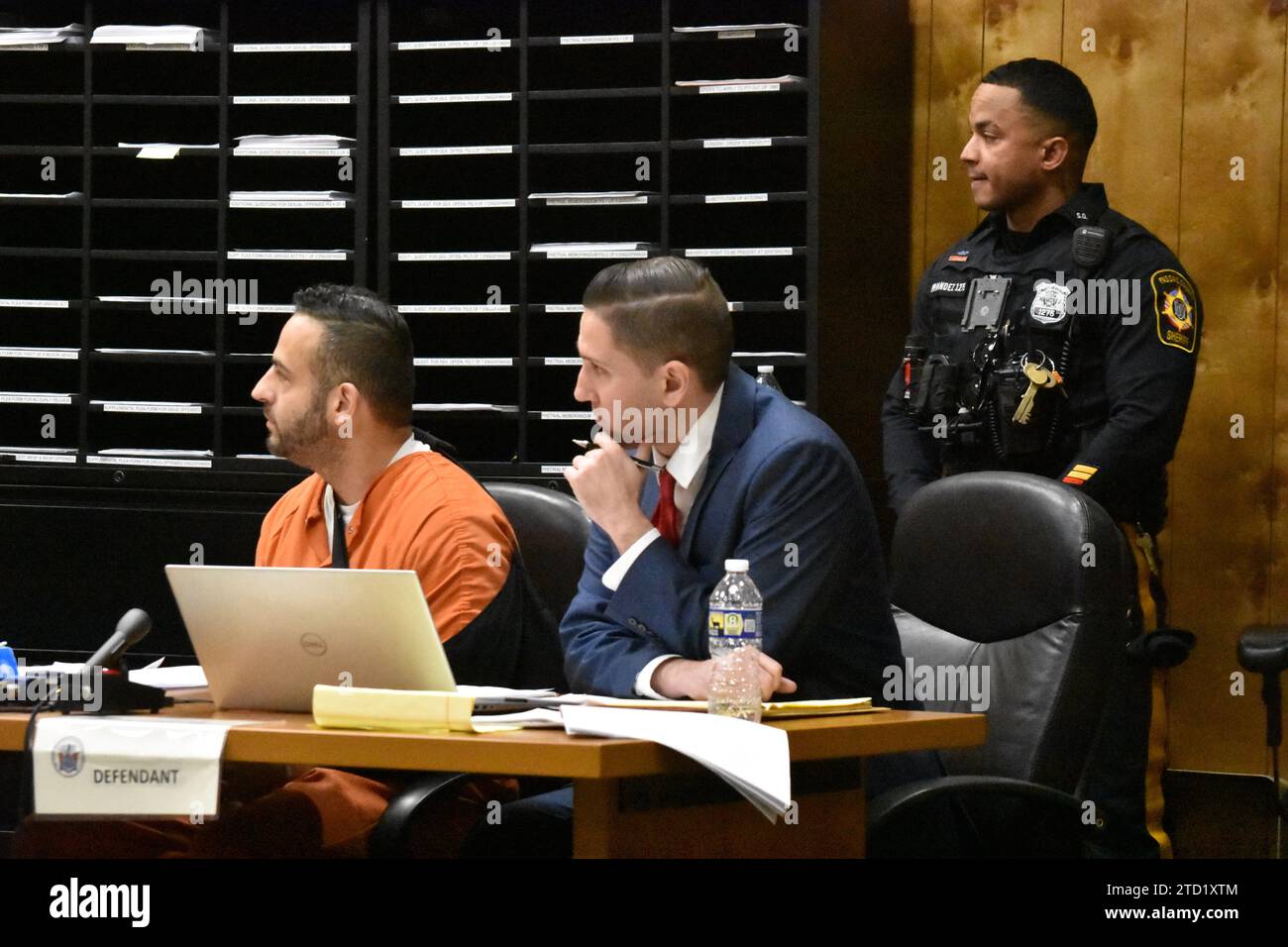 NYPD officer Hariton Marachilian sits at the defendant table inside of ...