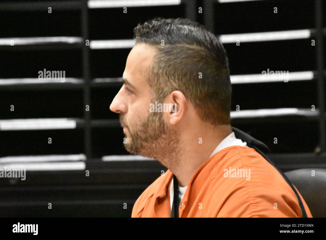 NYPD officer Hariton Marachilian sits at the defendant table inside of ...