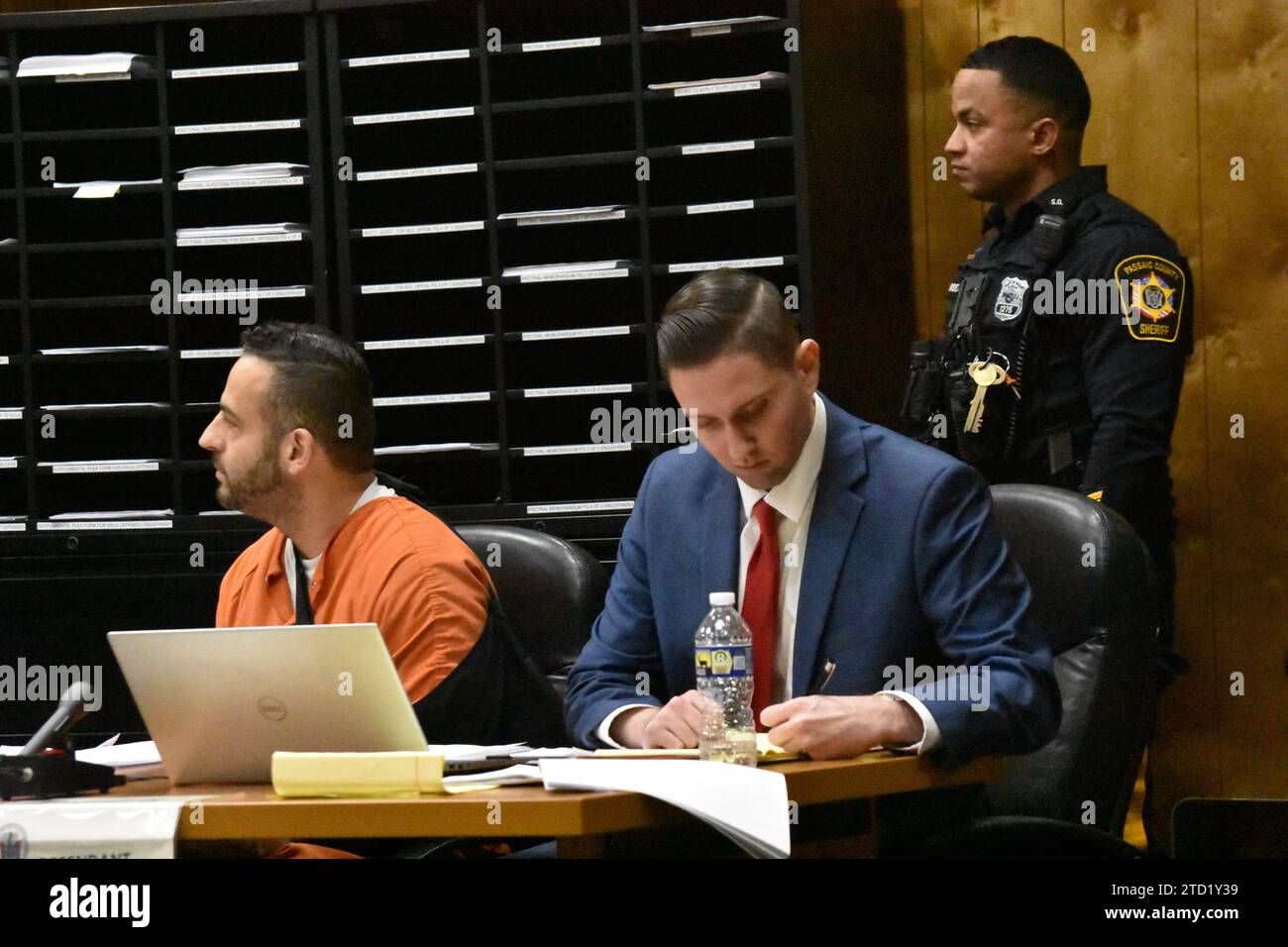 NYPD officer Hariton Marachilian sits at the defendant table inside of ...