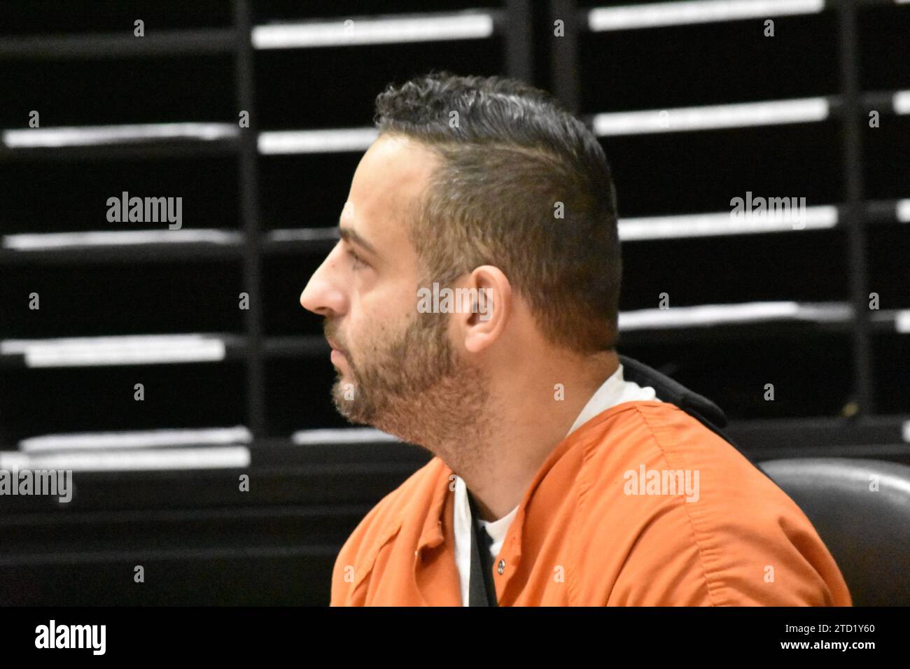 NYPD officer Hariton Marachilian sits at the defendant table inside of ...