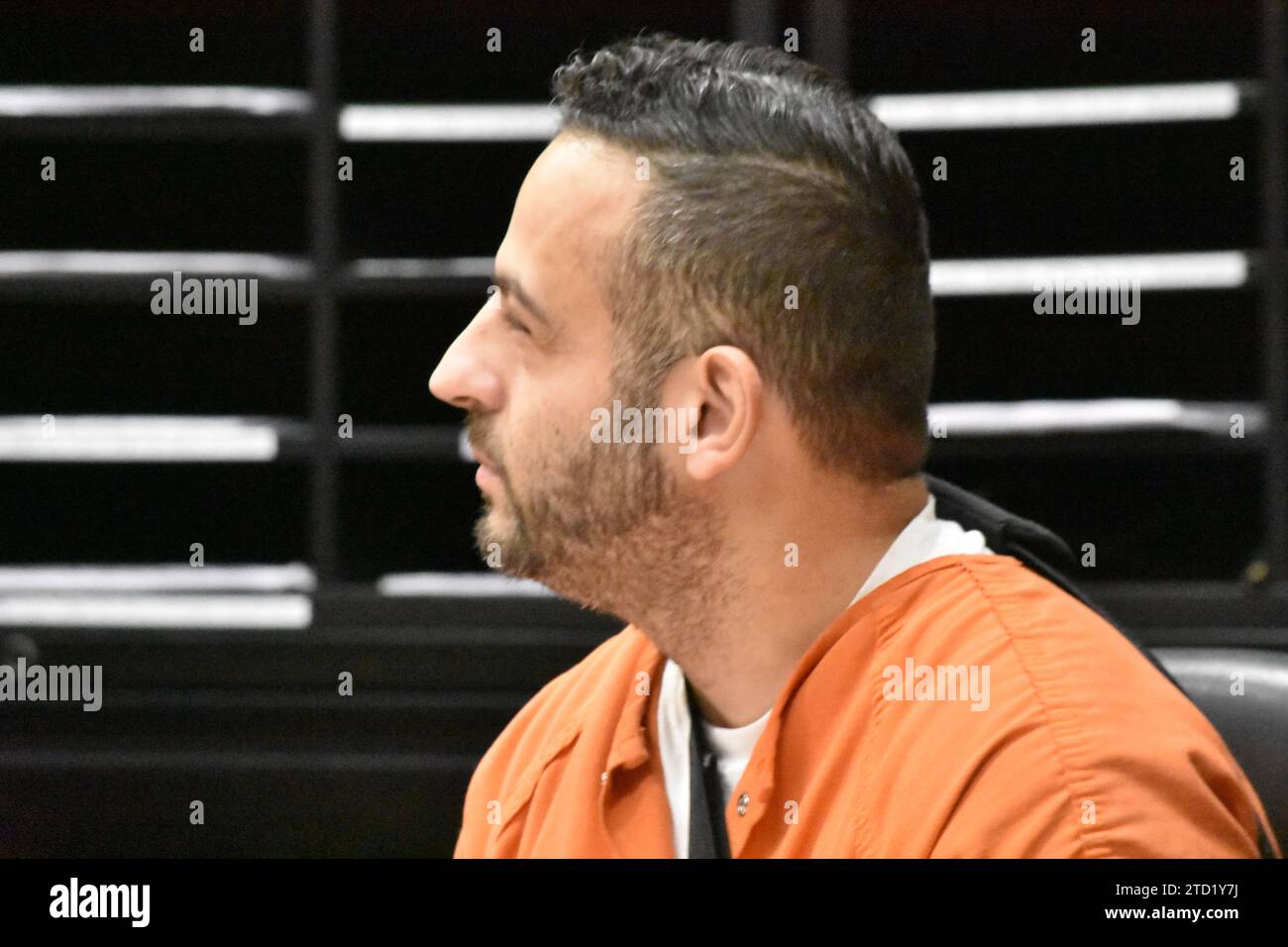 NYPD officer Hariton Marachilian sits at the defendant table inside of ...