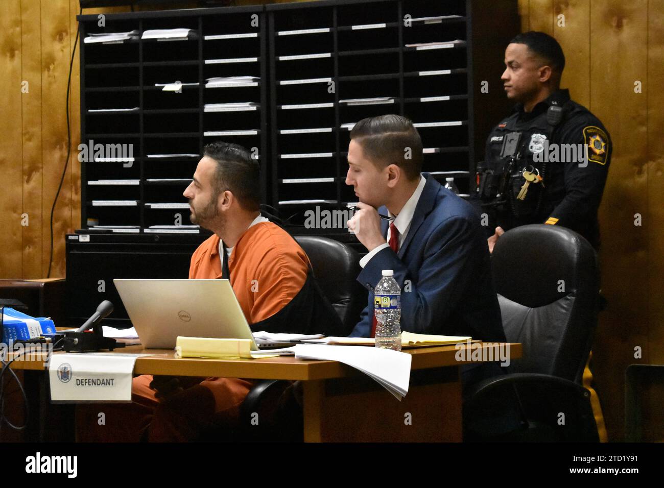 NYPD officer Hariton Marachilian sits at the defendant table inside of ...