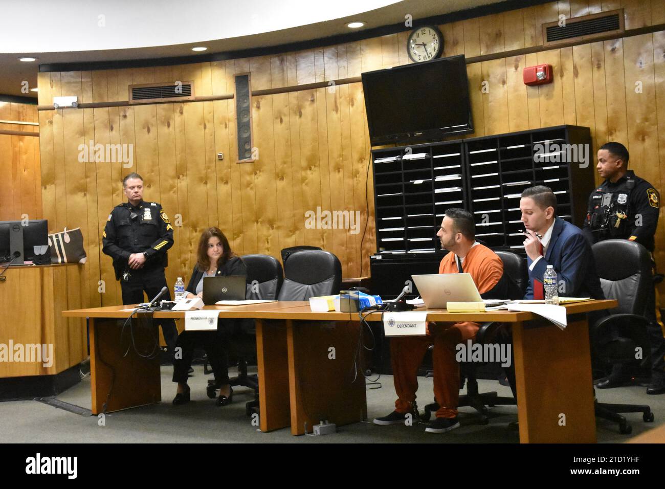 NYPD officer Hariton Marachilian sits at the defendant table inside of ...