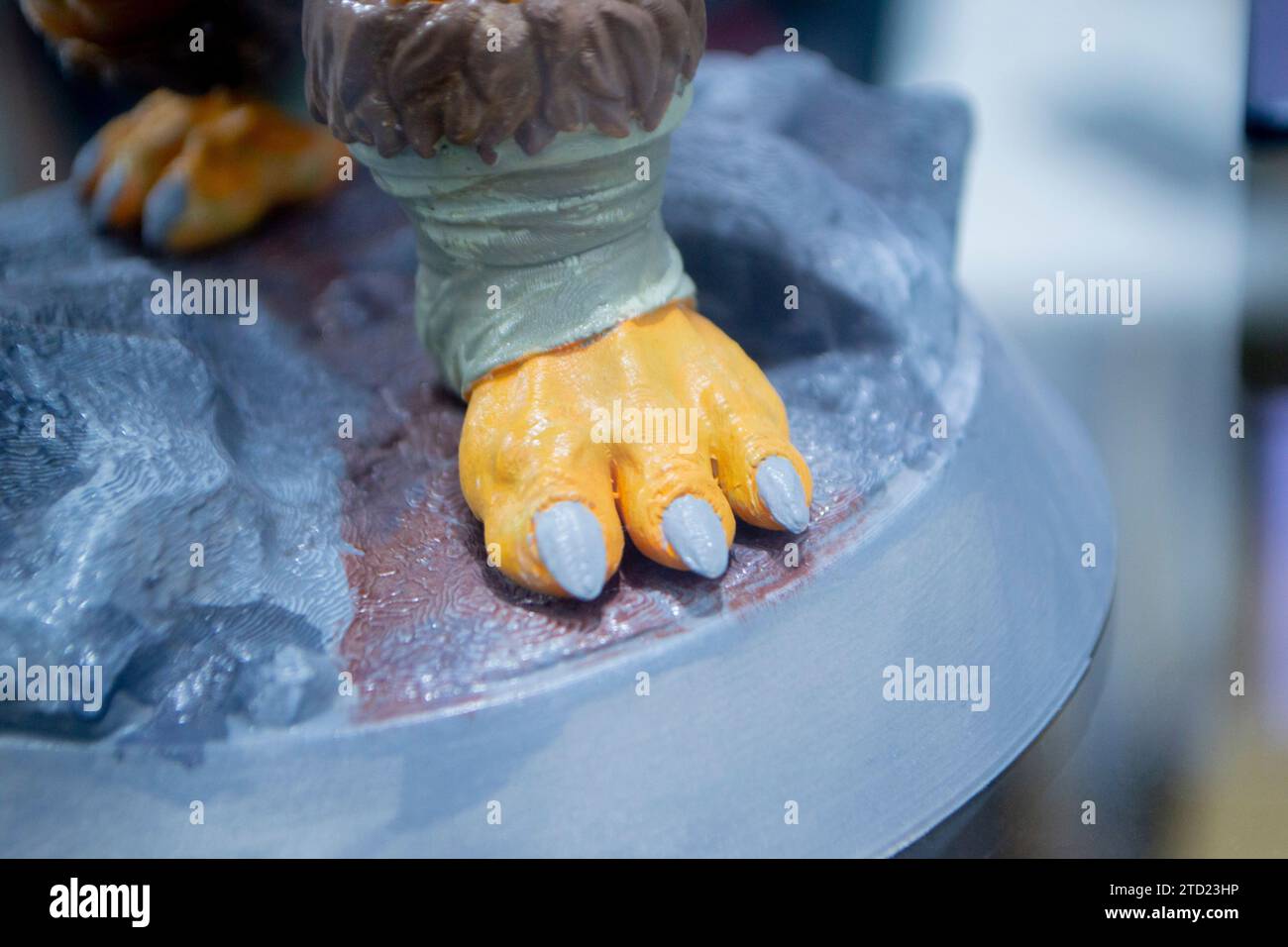 Prototype of art object 3D printed from melted plastic. Model of paw ...