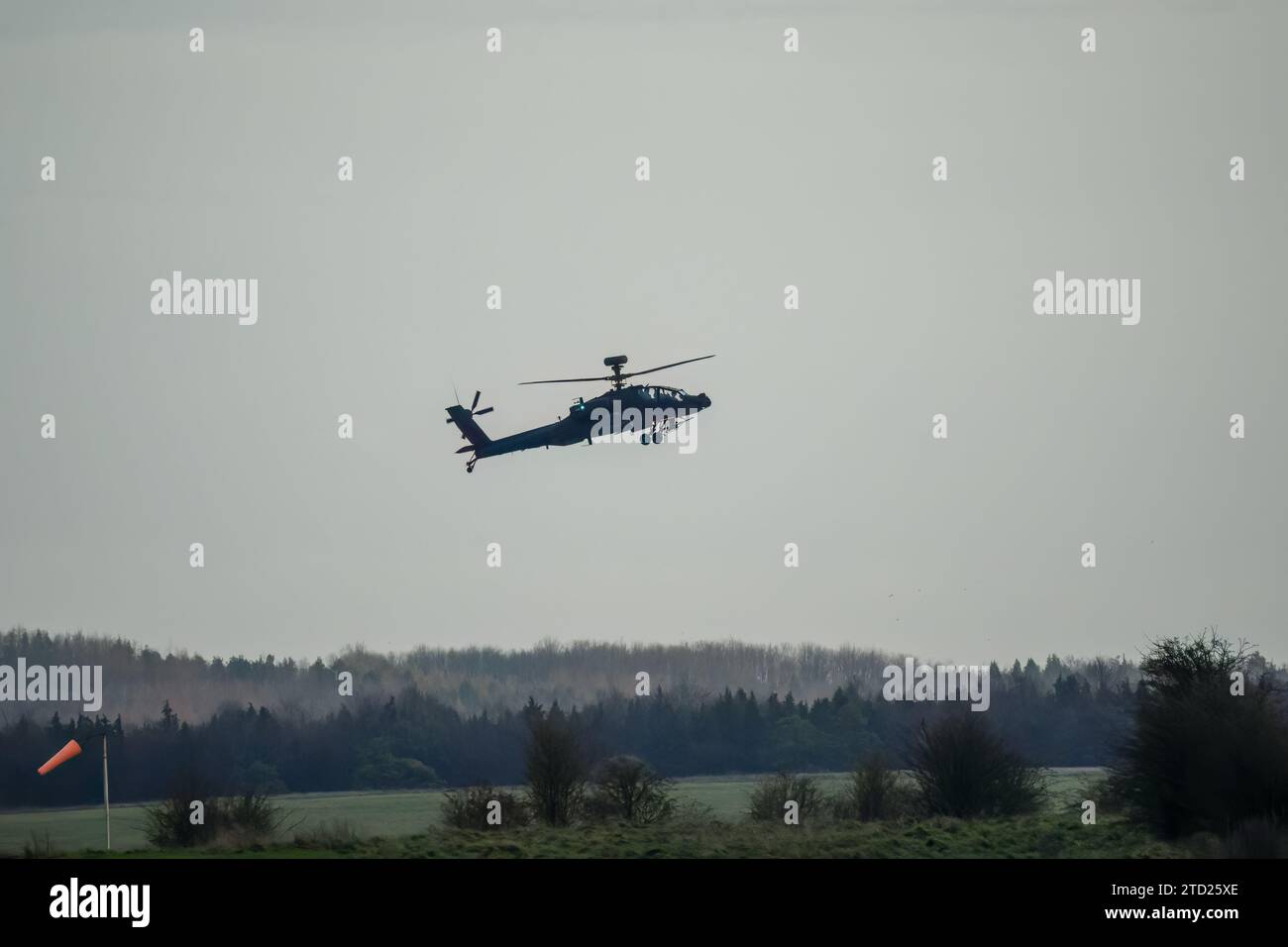 British army Apache AH64E AH-64E Helicopter Gunship in low level fligth ...