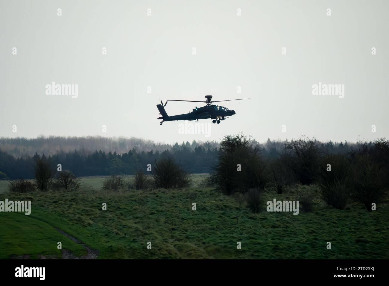 British army Apache AH64E AH-64E Helicopter Gunship in low level fligth ...
